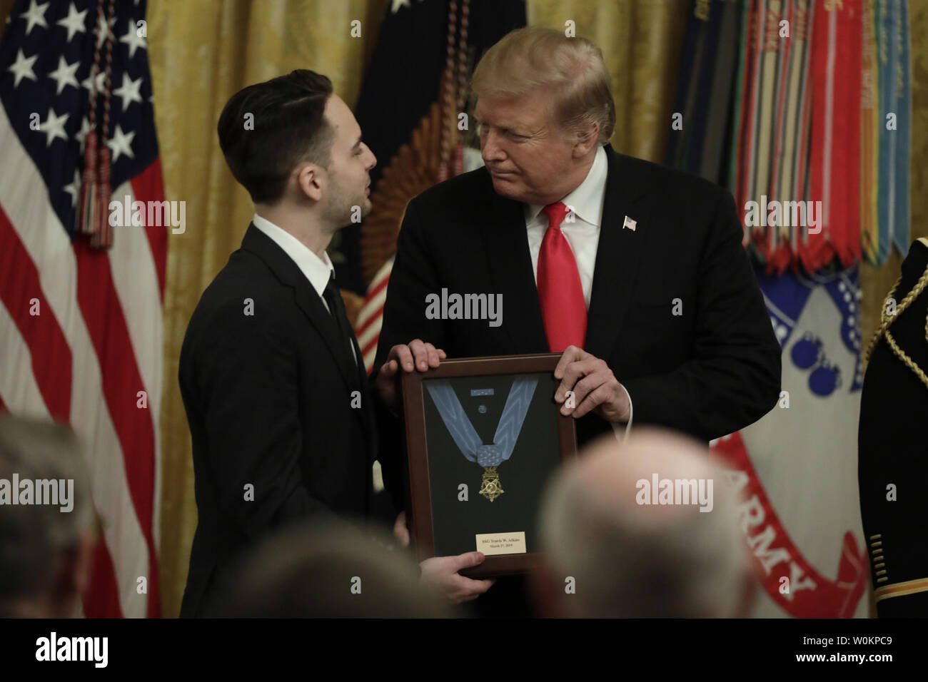 U.S. President Donald Trump presents the Medal of Honor posthumously to ...