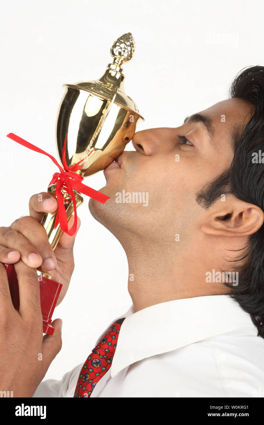 Kissing trophy hi-res stock photography and images - Alamy