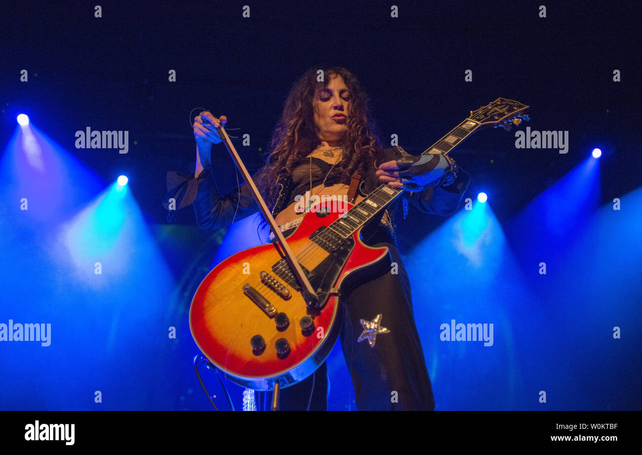 Lead guitarist Steph Paynes of Lez Zeppelin belts out a number at The ...