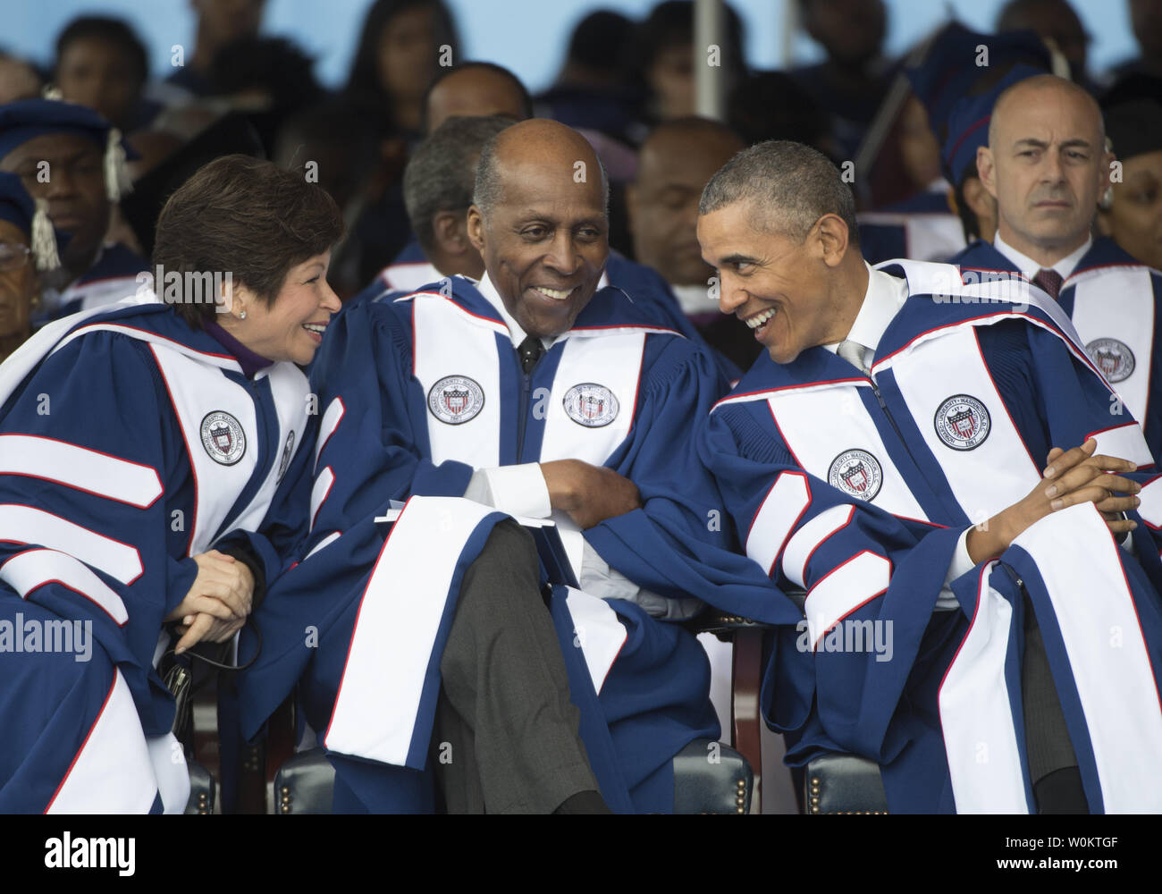 President Barack Obama chats with Valerie Jarrett and Vernon Jordan ...