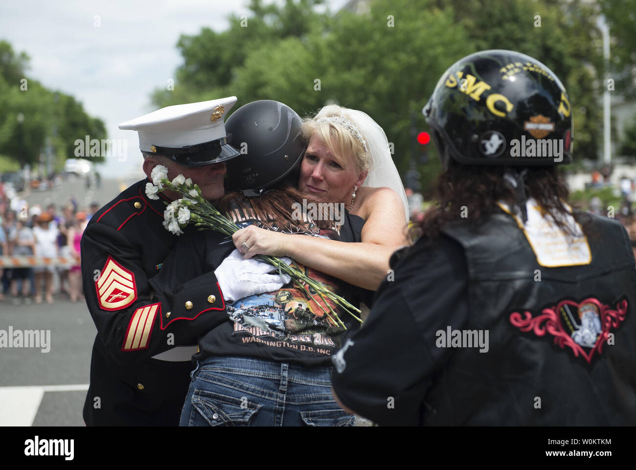 USMC SSgt. Tim Chambers and his bride Lorraine Chambers are ...