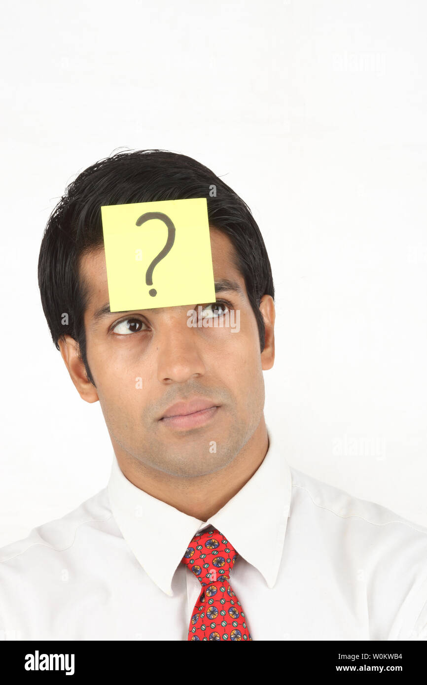 Businessman with question mark on adhesive note stuck to forehead Stock ...