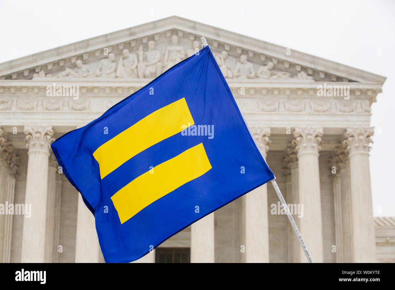 An HRC flag is held up in front of the Supreme Court during ...