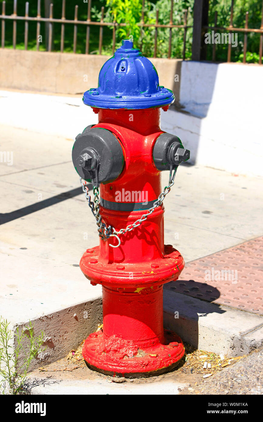 Red and Blue fire hydrant in downtown Bisbee AZ Stock Photo - Alamy