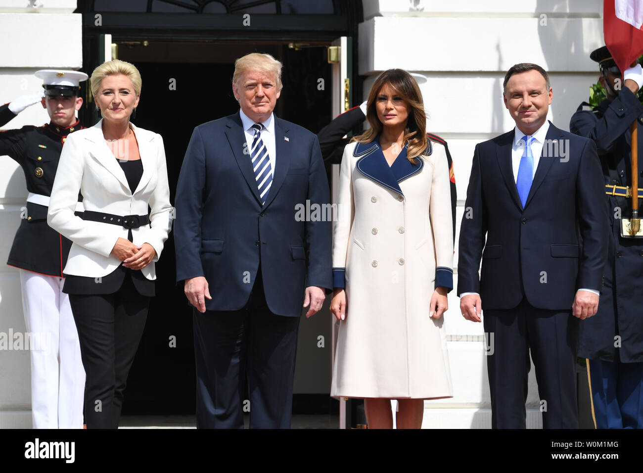 President Donald Trump and first lady Melania Trump greet Polish ...