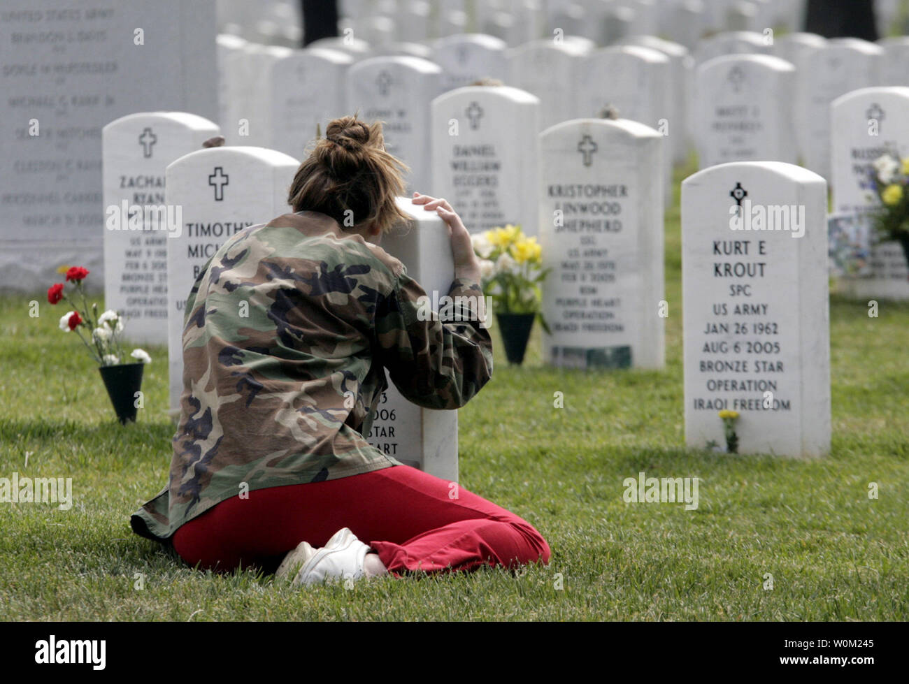 Kristin Kenney of Edison, NJ cries at the tombstones of her friend U.S ...