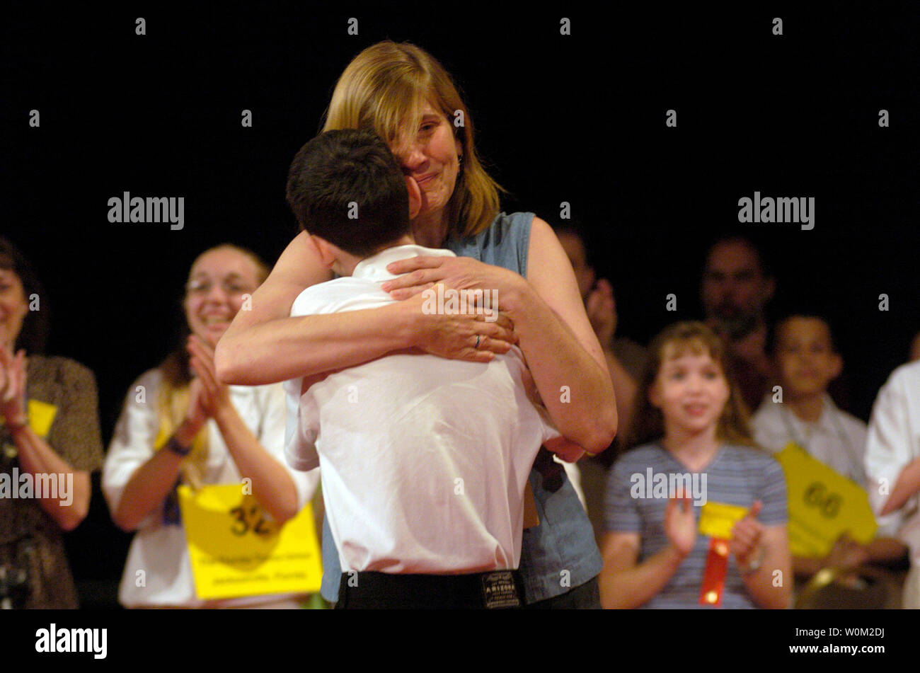 First place winner David Scott Tidmarsh, of Indiana, gets a big hug ...