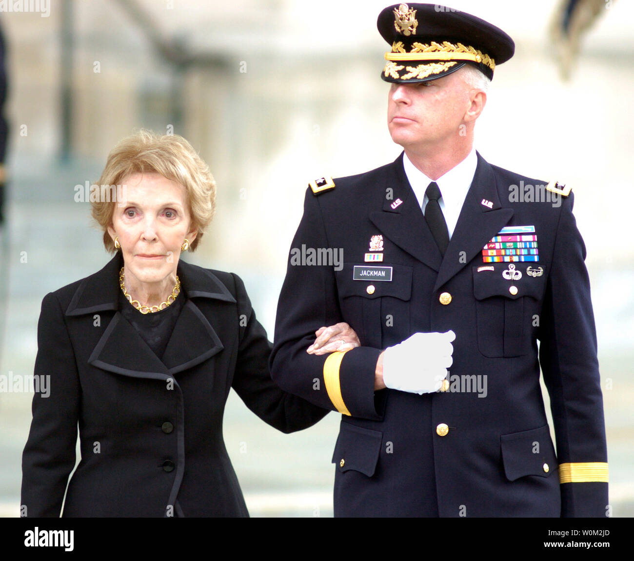 Nancy Reagan passes with her escort Major General Galen B. Jackman ...