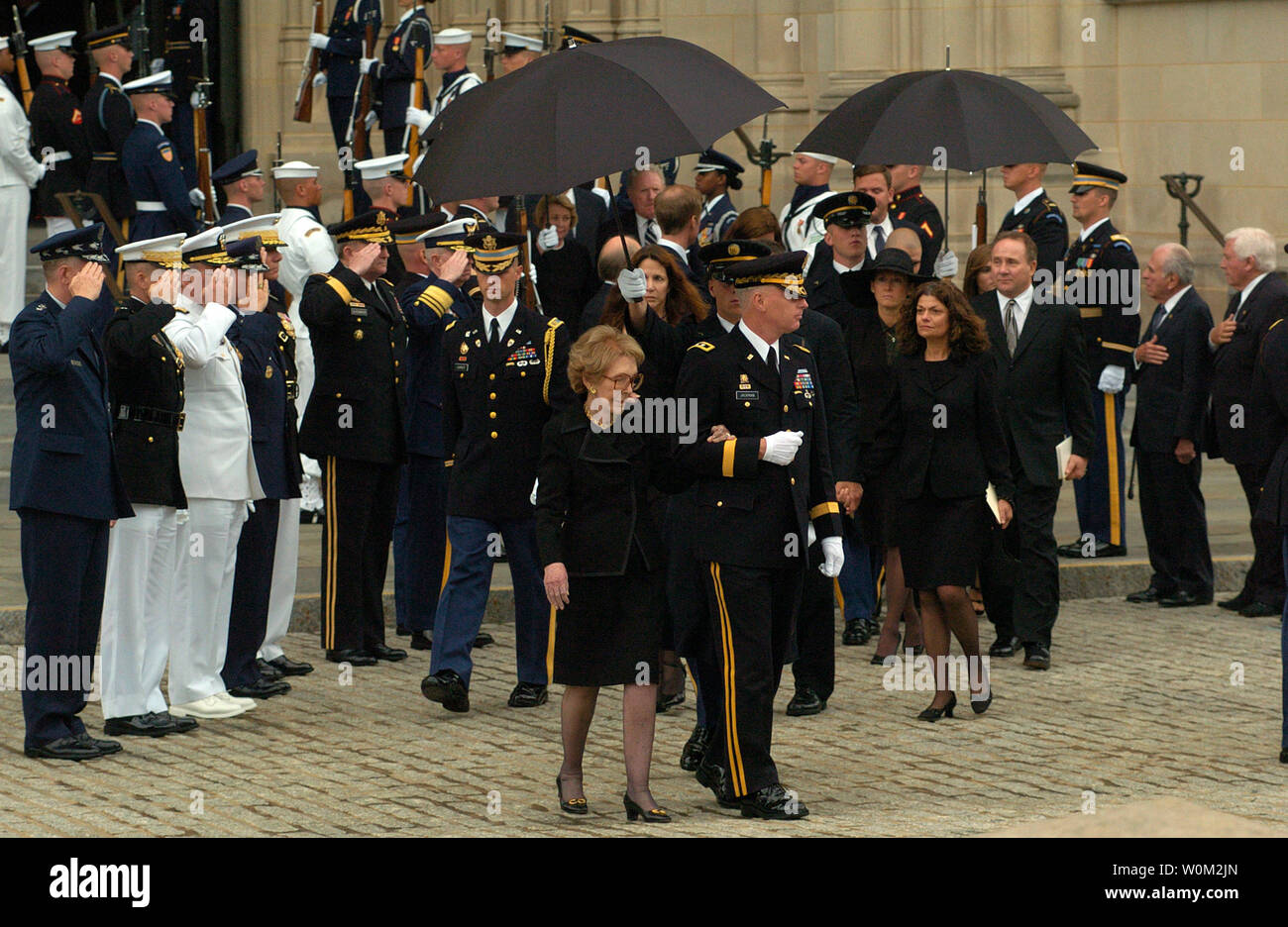 Nancy Reagan and family members exit the building at the State Funeral ...