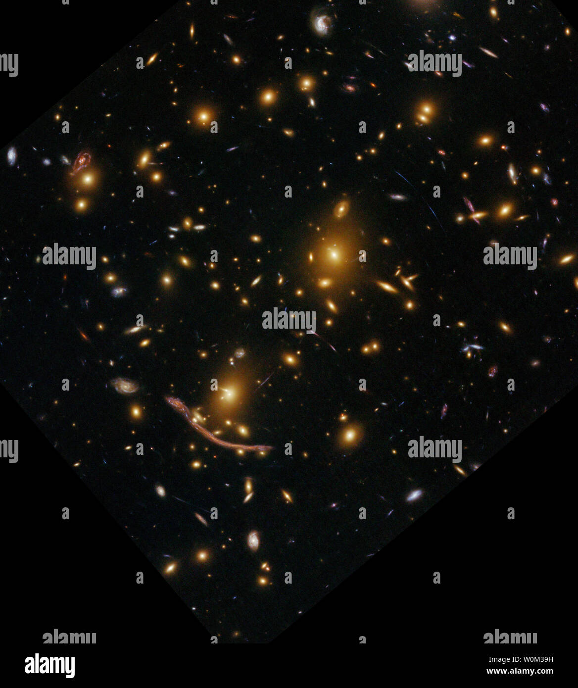 This image of Abell 370 was released in 2009. Compared the the new ...