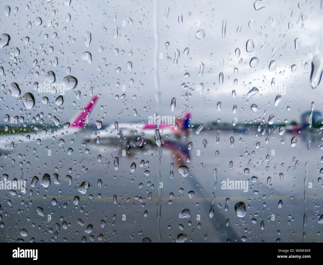 Warsaw, Poland - May 16, 2019: Rain at the airport, the view from the ...