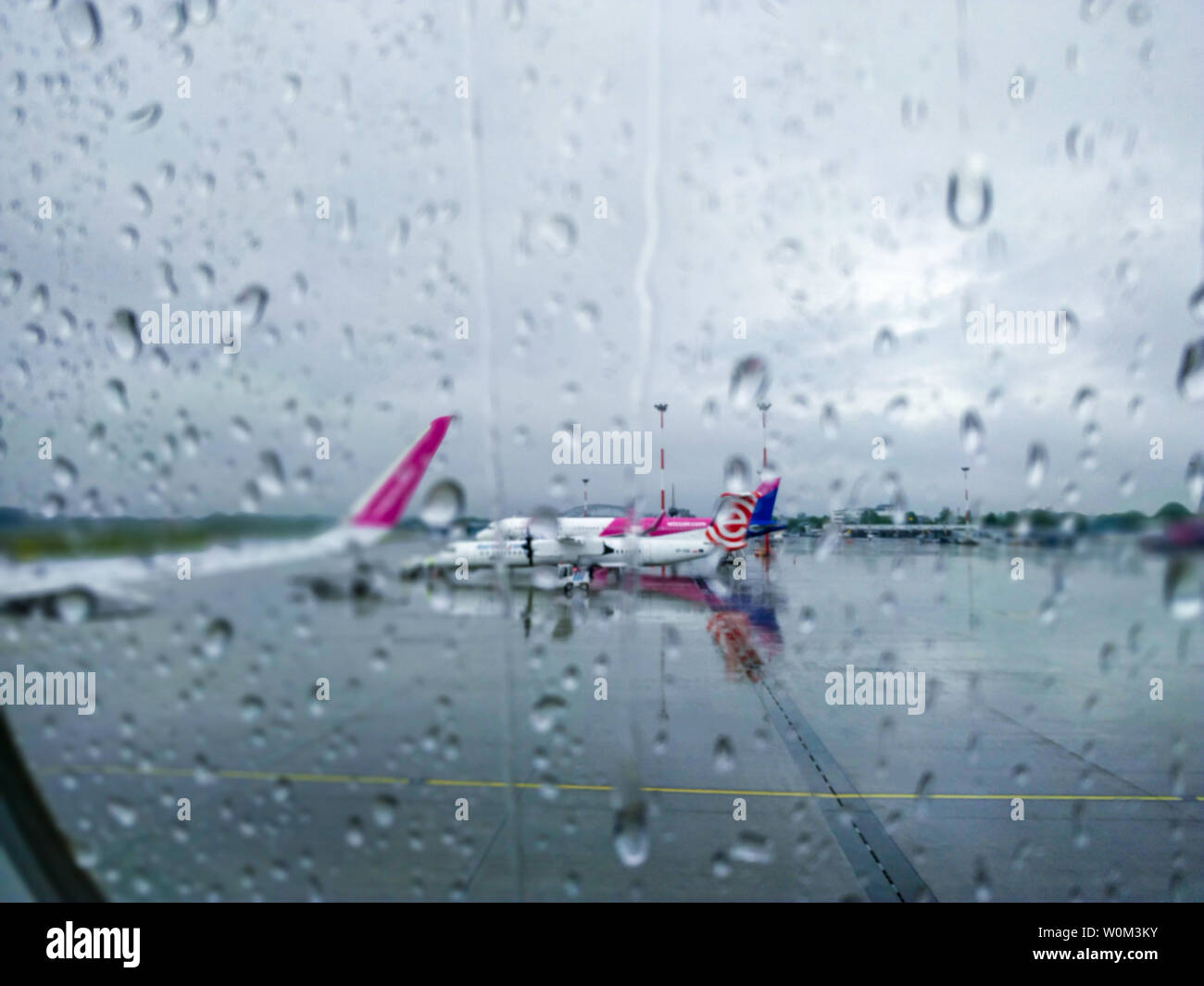 Warsaw, Poland - May 16, 2019: Rain at the airport, the view from the ...