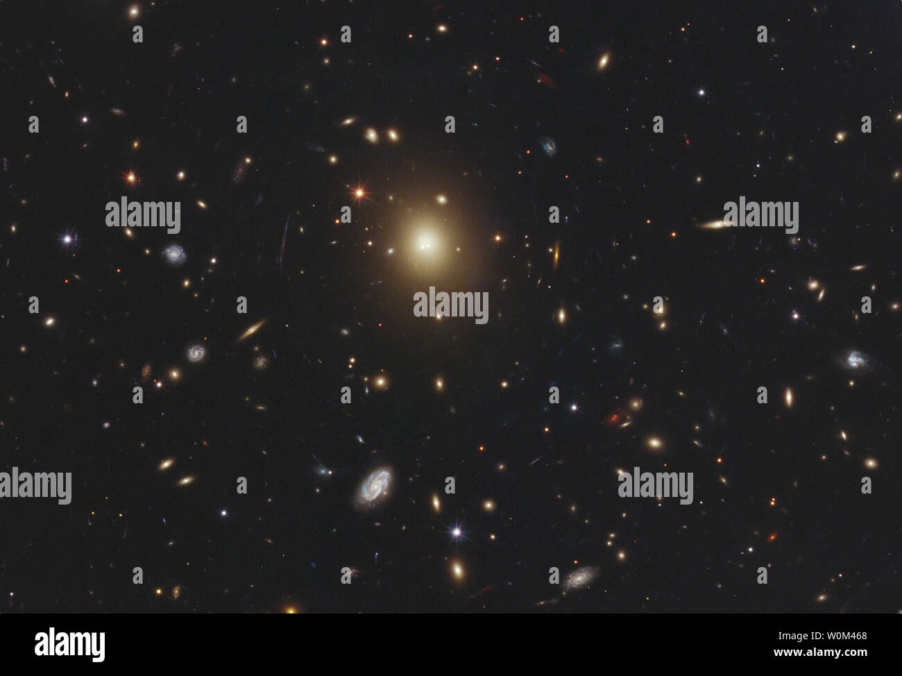 The giant elliptical galaxy in the center of this image, released on ...