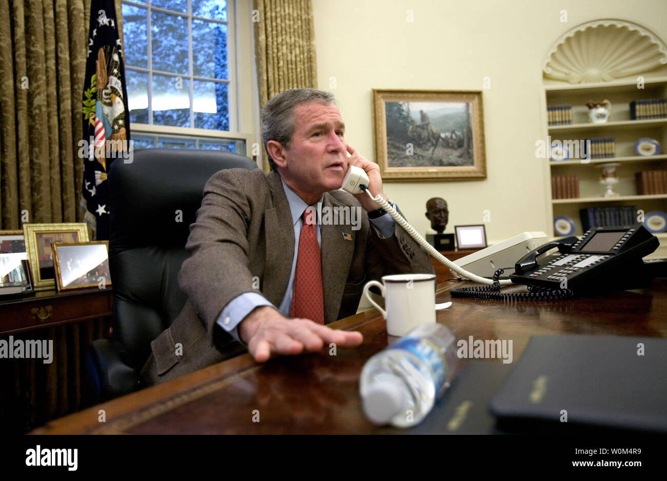 President George W. Bush speaks with British Prime Minister Tony Blair ...