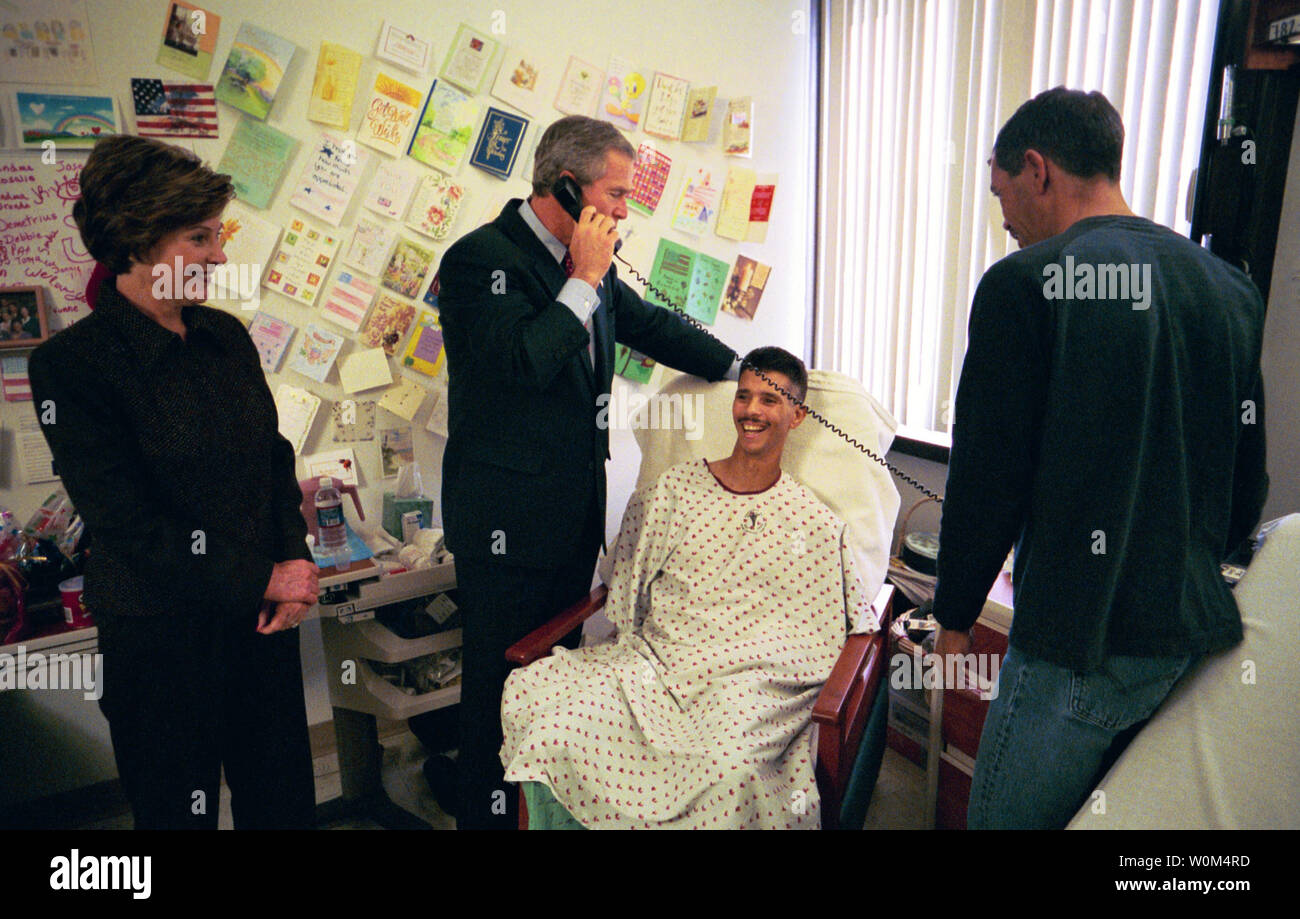 President George W. Bush speaks to a relative of U.S. Army Sergeant ...