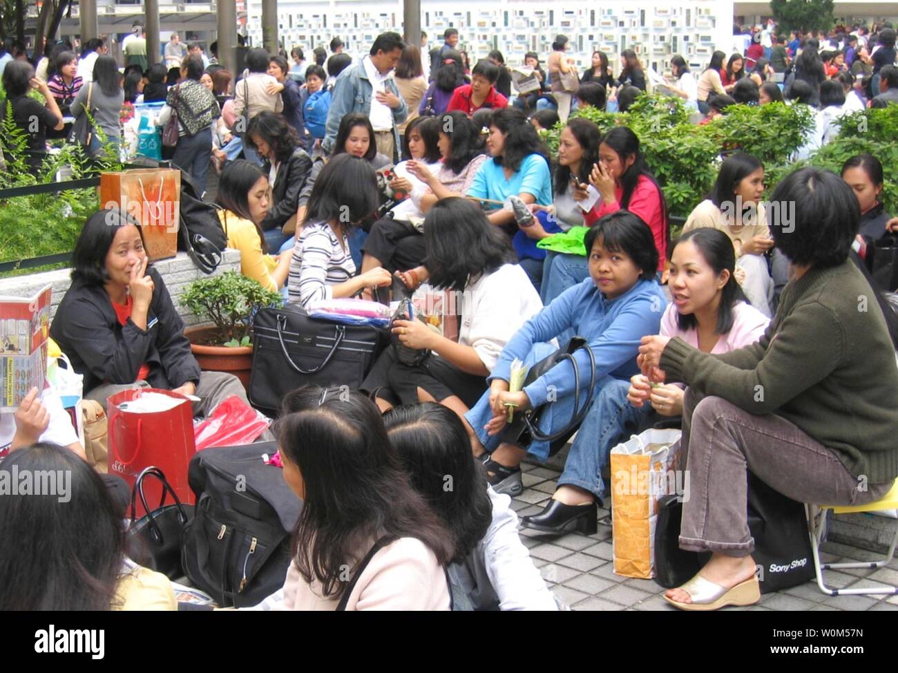 Every Sunday, Hong Kong's Statue Square is crowded with foreign ...