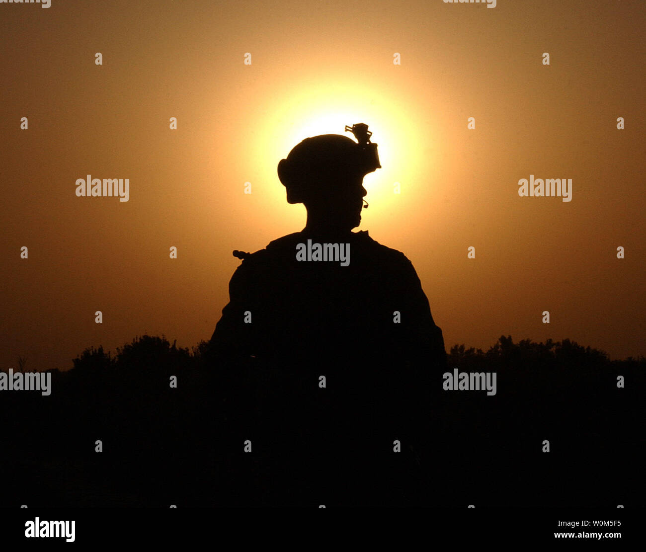 Lt. Eric Stoutenburg, Platoon Leader, 2nd Brigade Recon Troop, scans ...