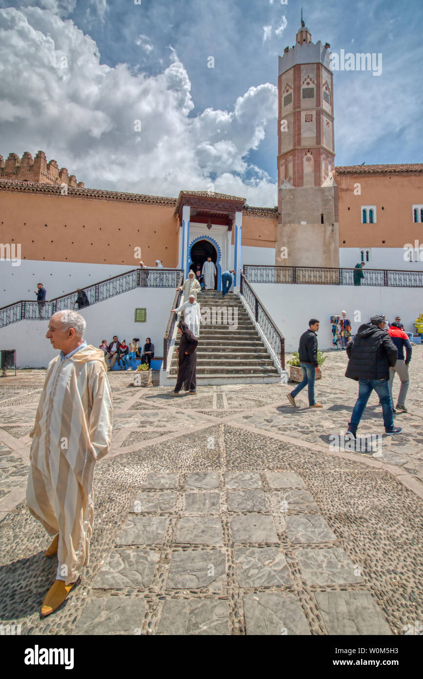 Chefchaouen, Morocco - May 03, 2019: Several Muslim men leaving the ...