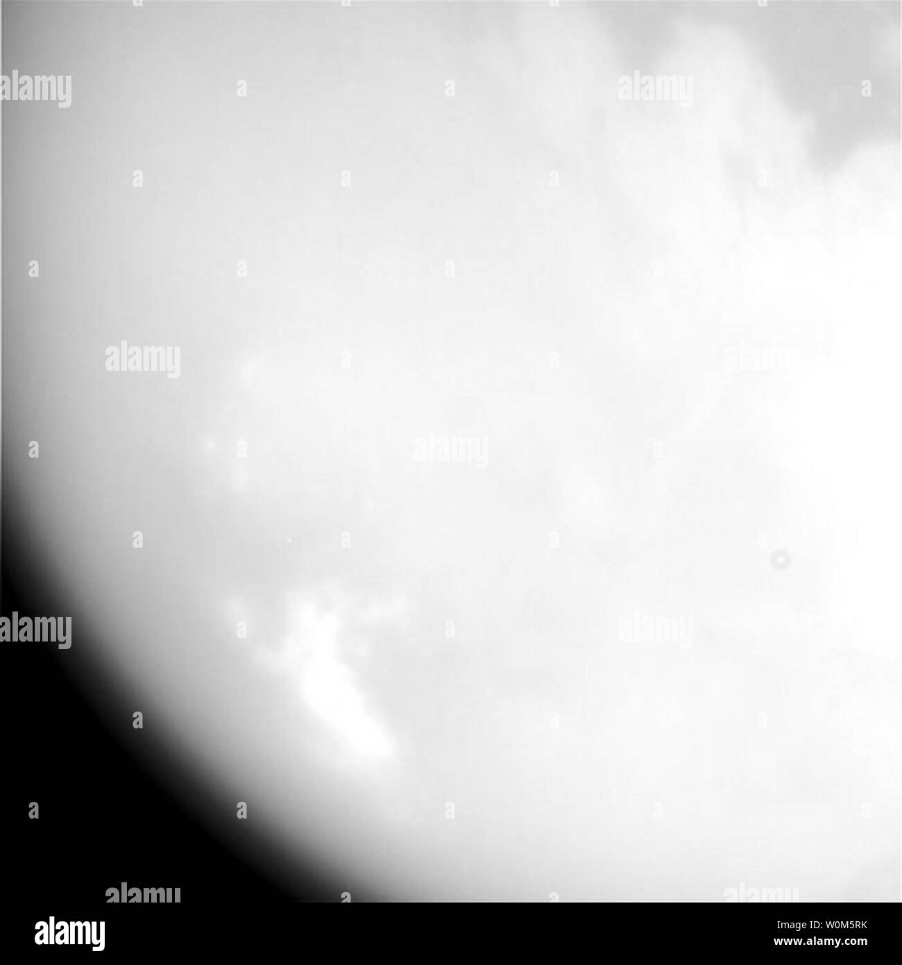 This image is one of the closest ever taken of Saturn's hazy moon Titan ...