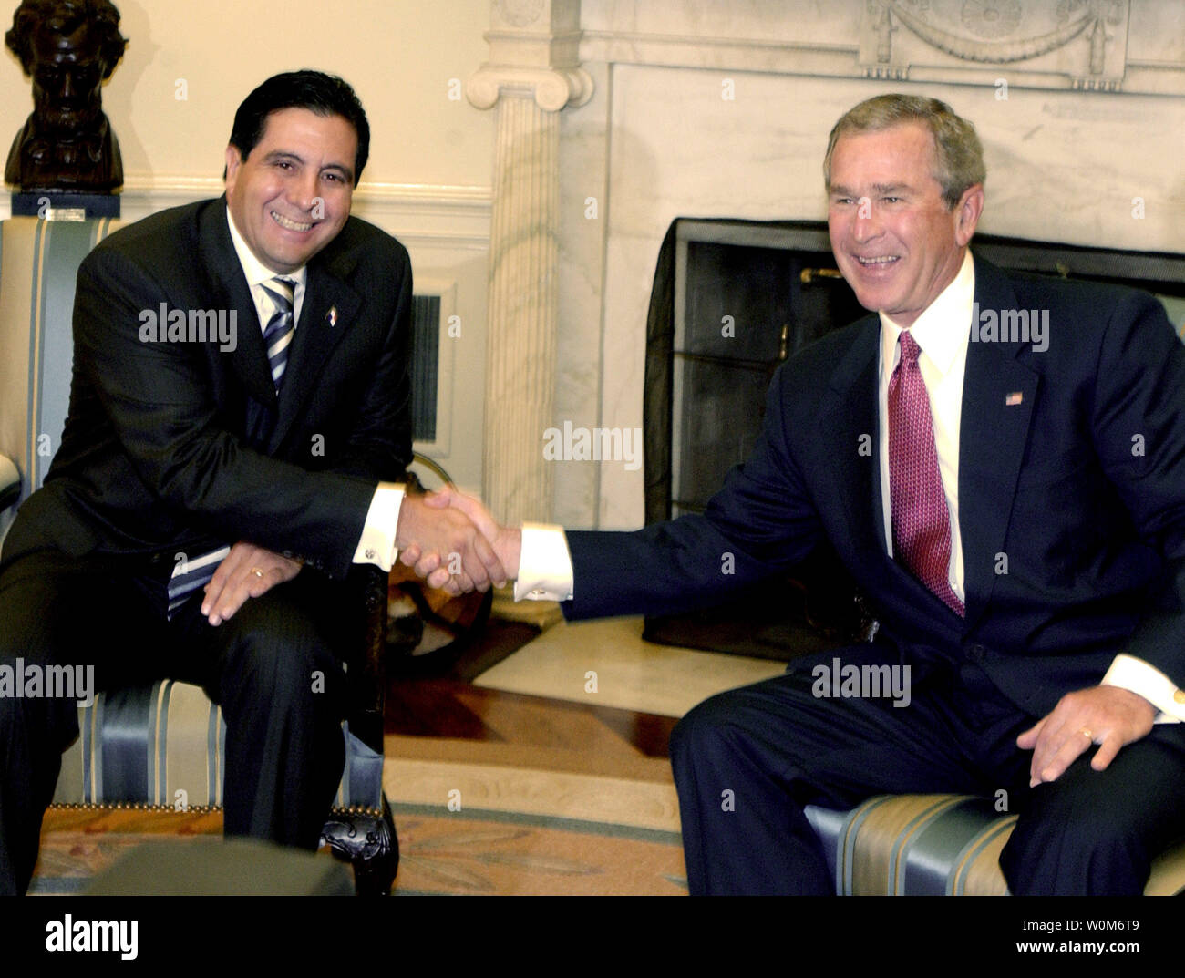 United States President George W. Bush welcomes President Martin ...
