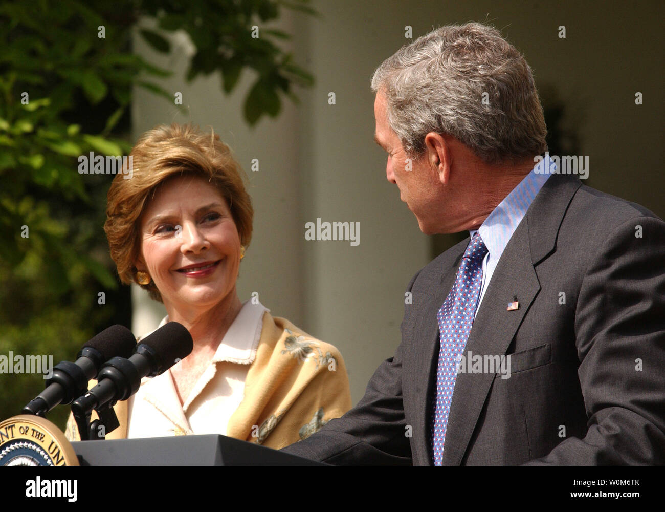President George W. Bush looks at First Lady Laura Bush during the ...