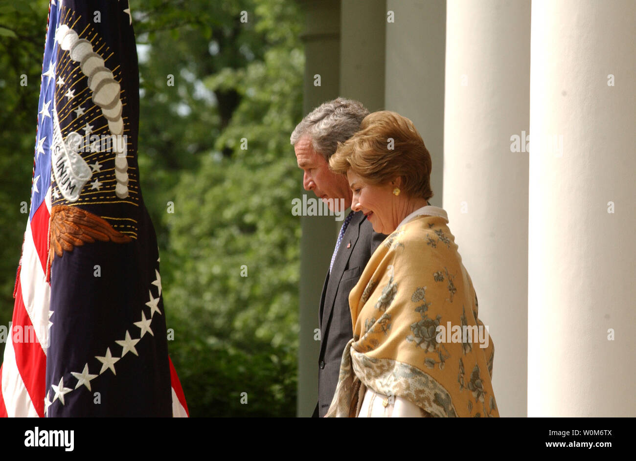 President George W. Bush and First Lady Laura Bush enter the Rose ...