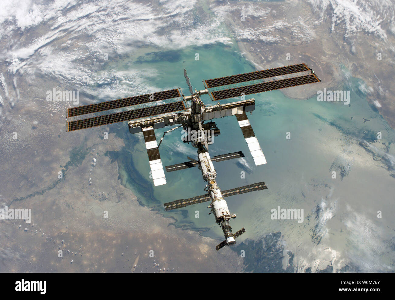 This full view of the International Space Station orbiting over a ...