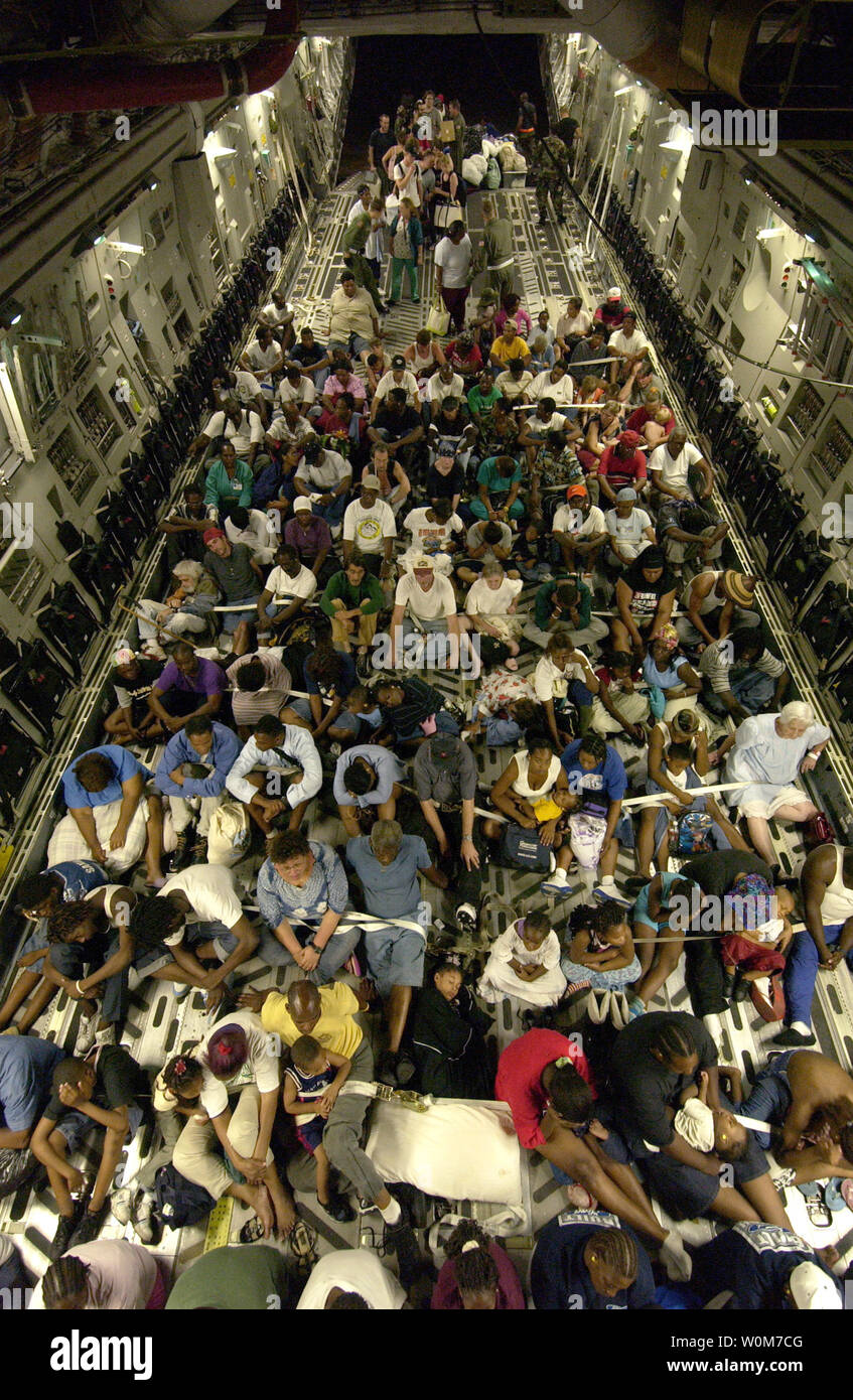 Hurricane Katrina evacuees await departure from New Orleans onboard a C ...