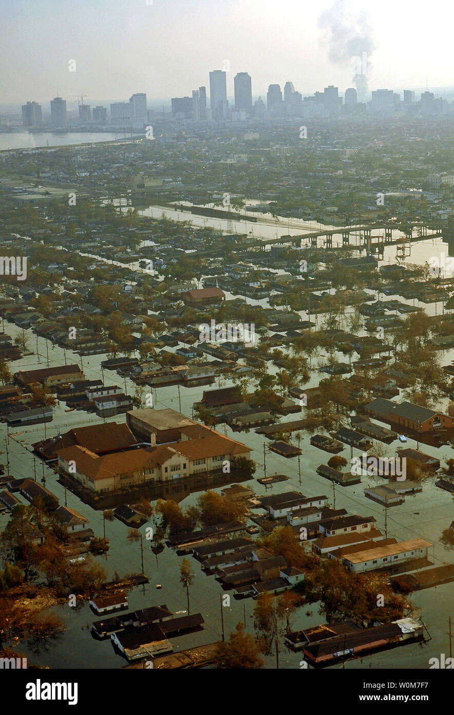 A submersed suburb of New Orleans sits below the skyline of an ...
