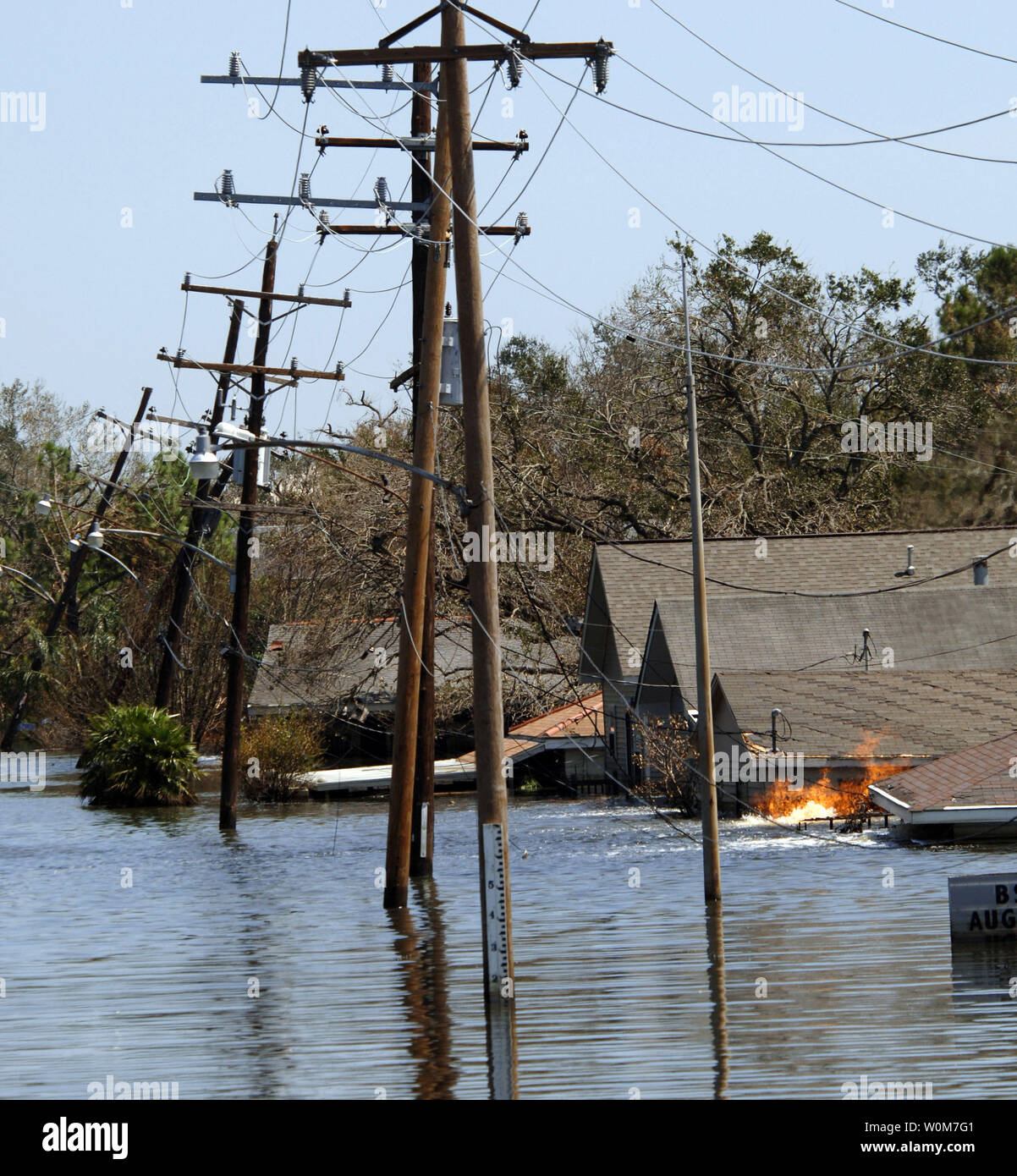 Natural gas leaking from below the flooded streets of New Orleans burns ...