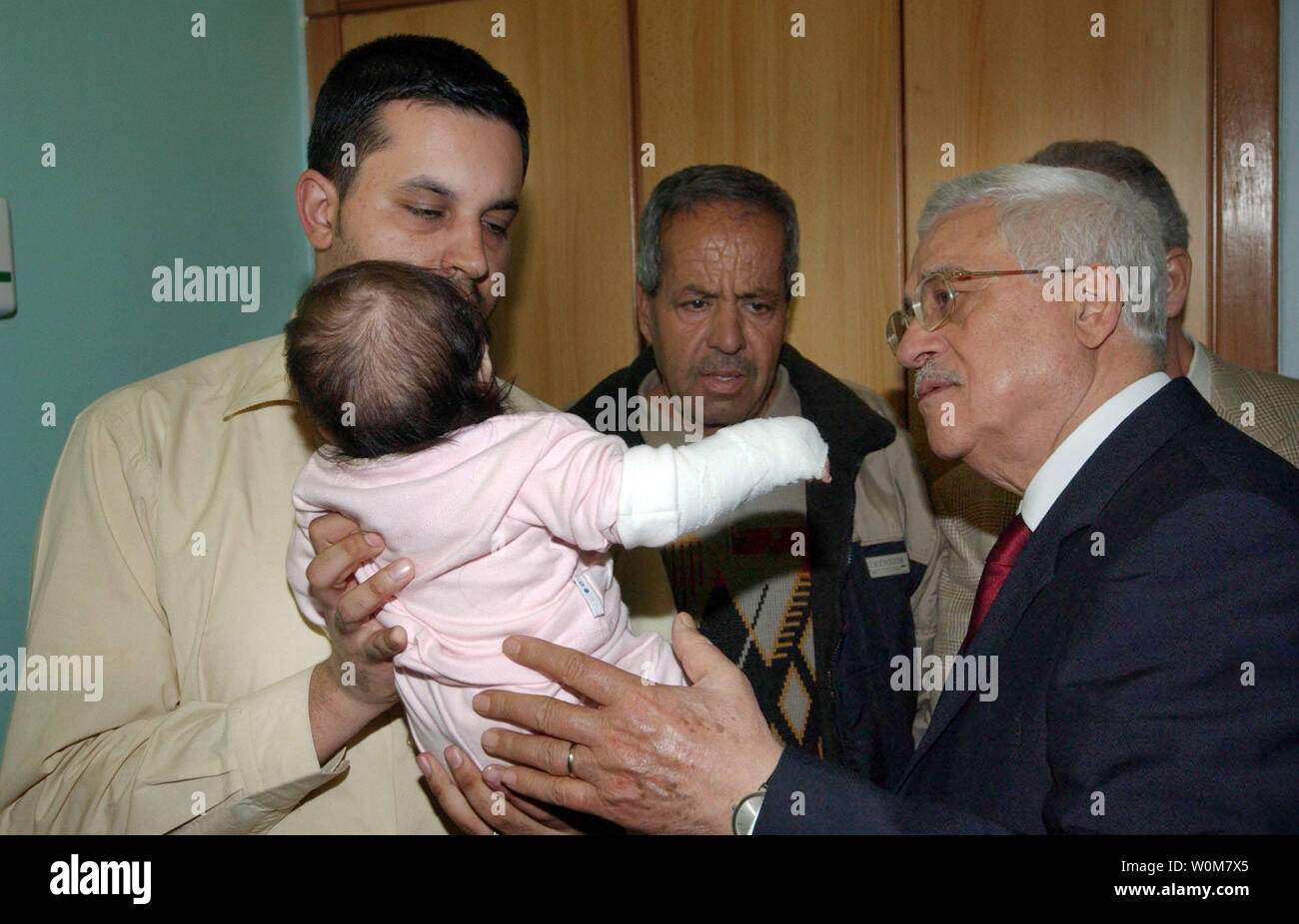 Palestinian President Mahmoud Abbas visits a young victim of terroirist ...
