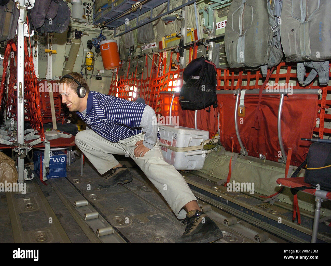 NFL player Patrick Kerney (Atlanta Falcons) gets in some stretching ...