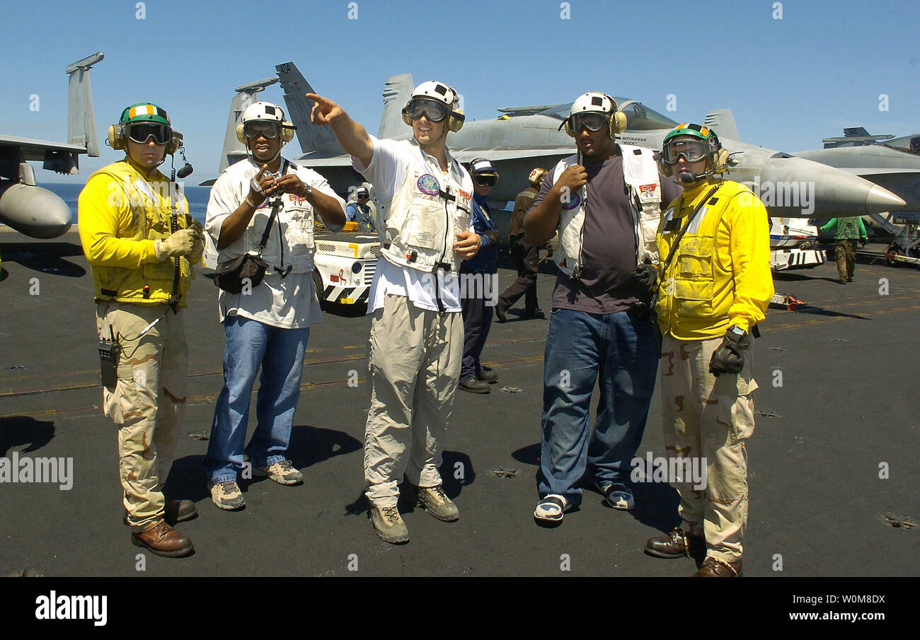 NFL players (L-R) Bryce Fisher (Seattle Seahawks), Patrick Kerney ...