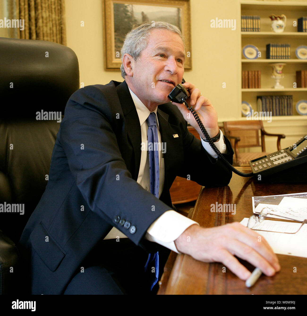 President George W. Bush speaks with crew members of the Space Shuttle ...