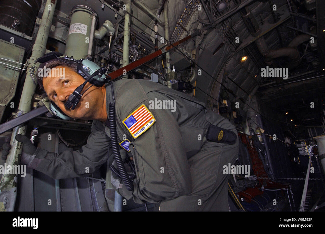 U.S. Air National Guard Chief Master Sgt. Chris Santor, load master ...