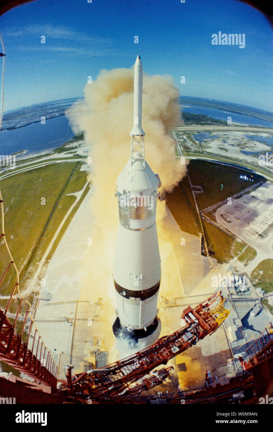Apollo 15 builds thrust prior to lift-off on July 26, 1971. Apollo 15 ...