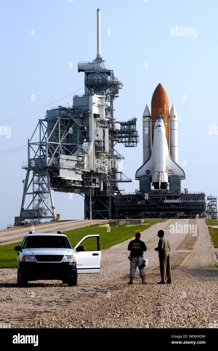 Security is on hand as Space Shuttle Atlantis arrives on Launch Pad 39B ...