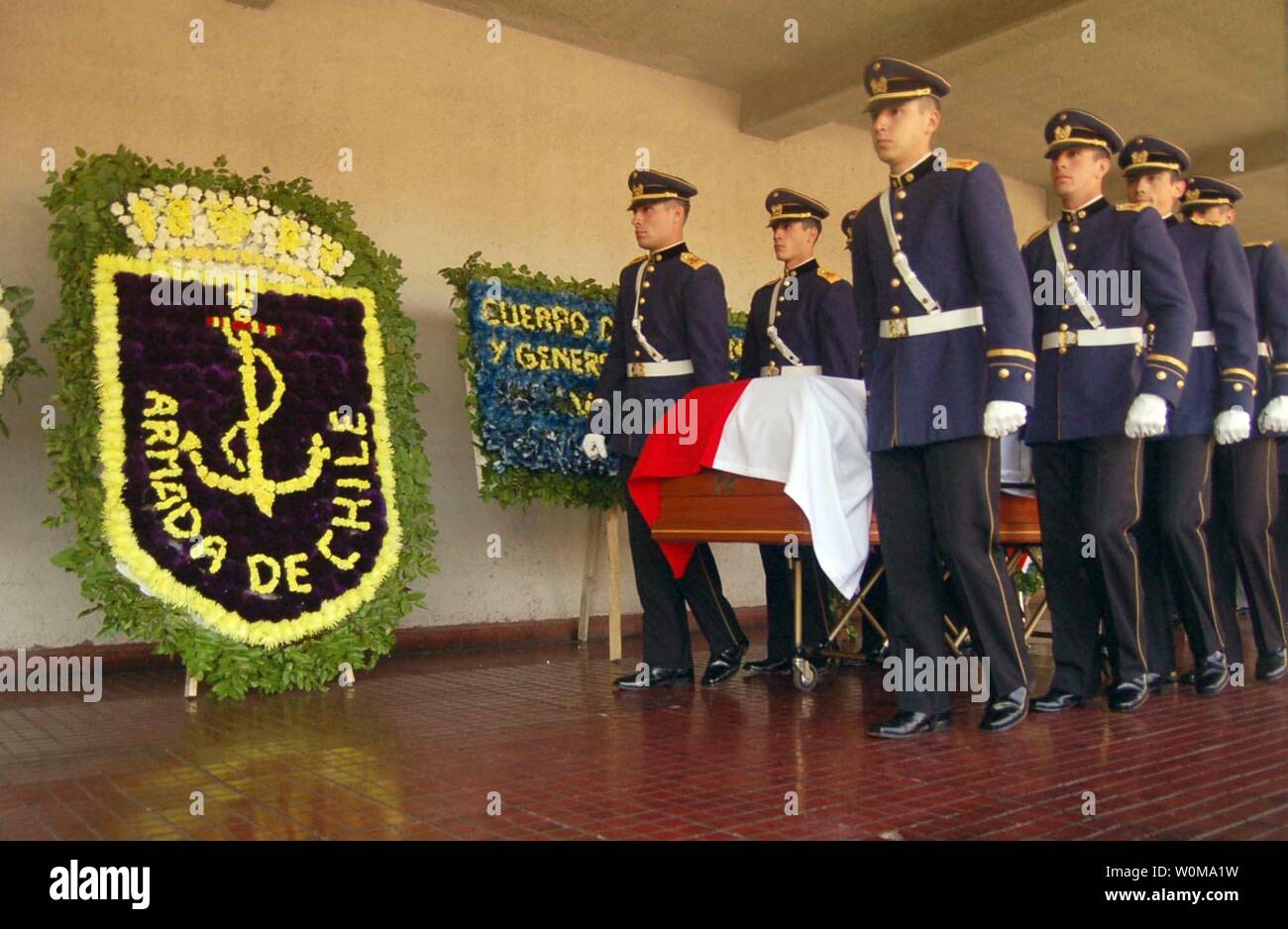 The coffin of Gen. Augusto Pinochet is carried by Honor Guard soldiers ...