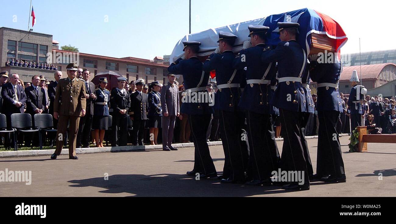 The coffin of Gen. Augusto Pinochet is carried by Honor Guard soldiers ...