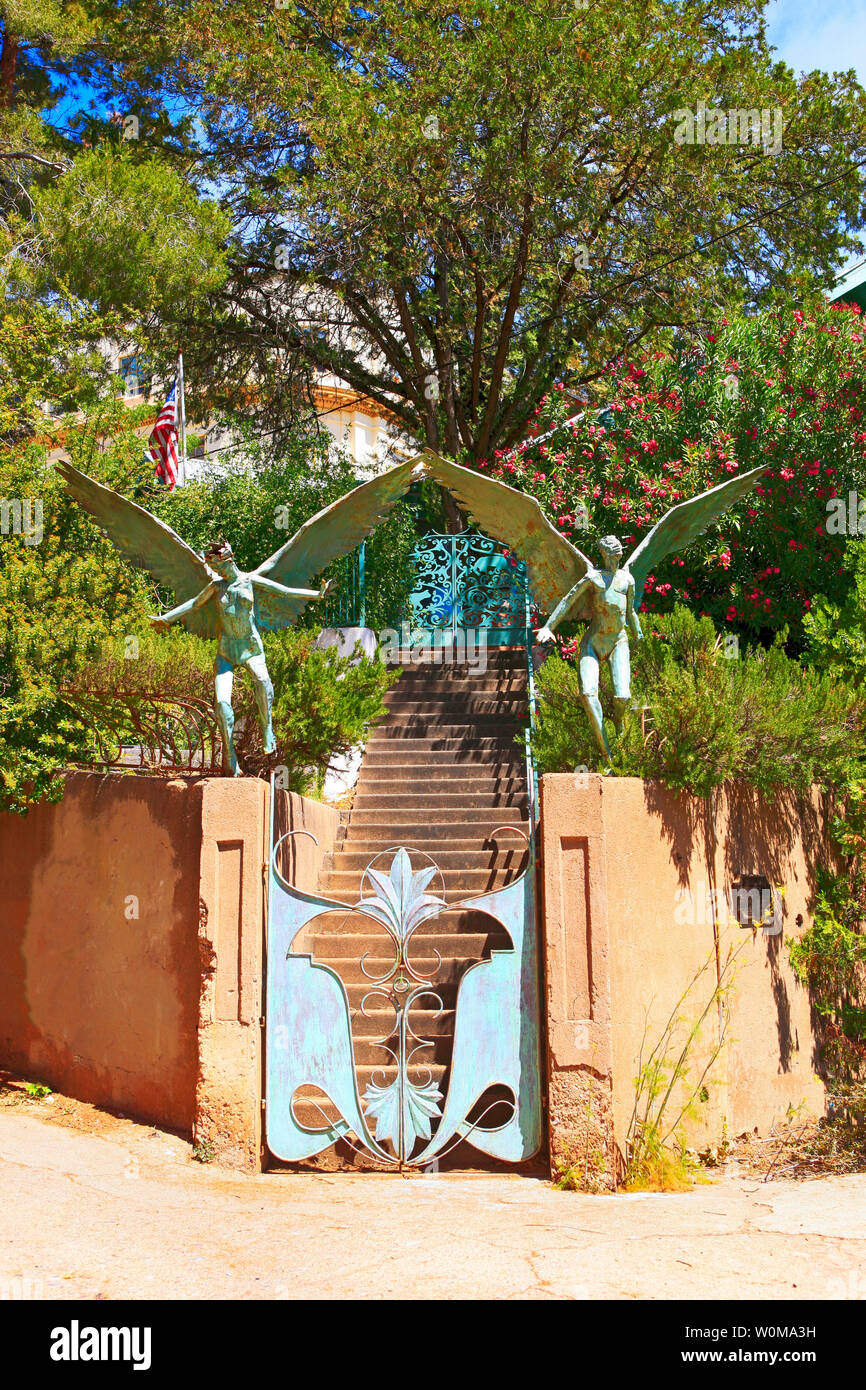 Art deco/nouveau nymph statues and gate leading to a hillside home in ...