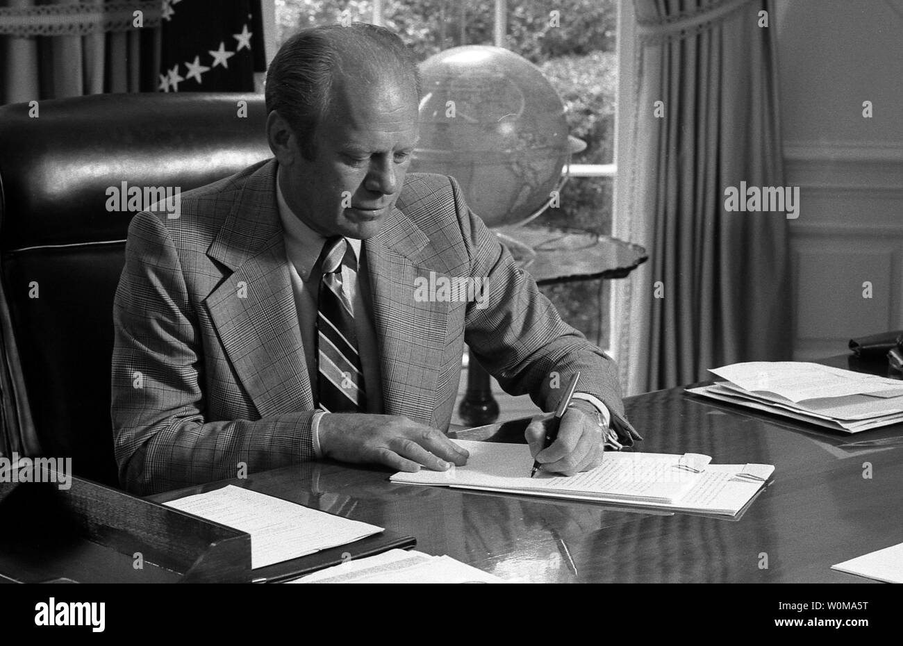 President Gerald Ford, shown in a June 19, 1975 file photo in the Oval ...