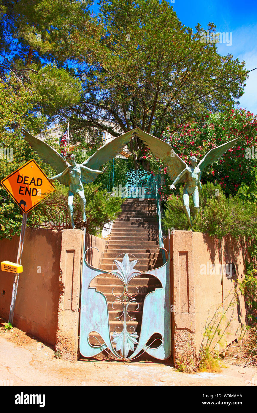 Art deco/nouveau nymph statues and gate leading to a hillside home in ...