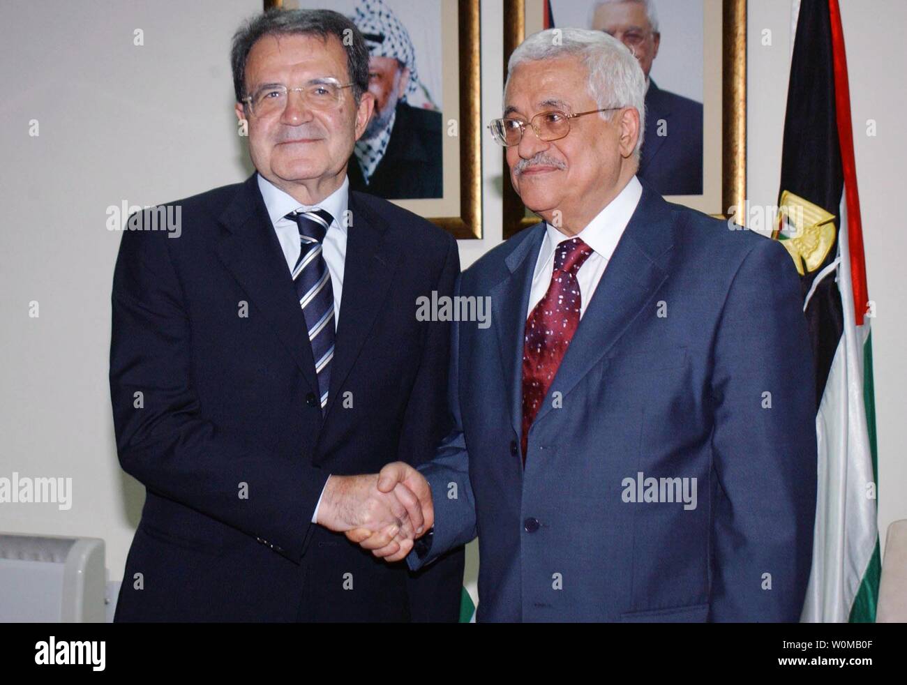 Italian Prime Minister Romano Prodi shakes hands with Palestinian ...