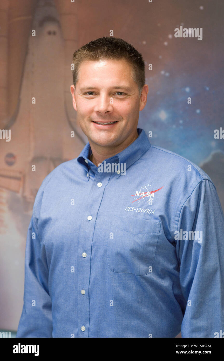 Astronaut Douglas H. Wheelock, STS-120 mission specialist, poses for a ...