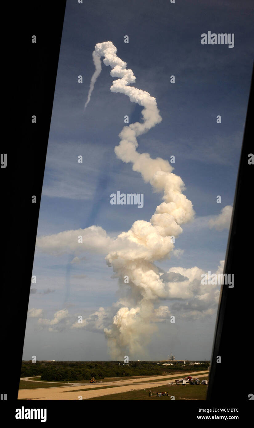 The launch of the Space Shuttle Atlantis (STS-122) is seen through the ...