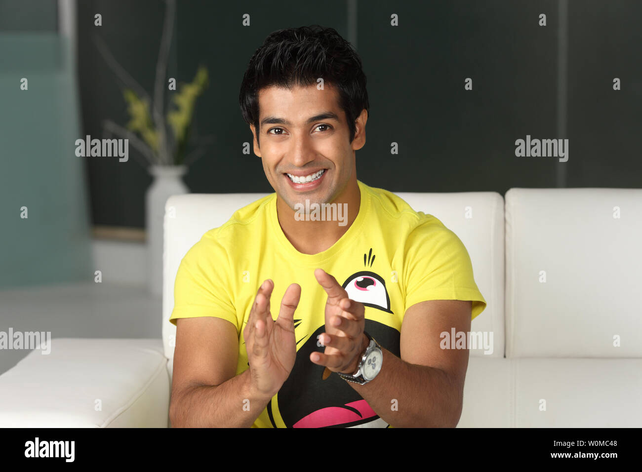 Man clapping hands Stock Photo - Alamy