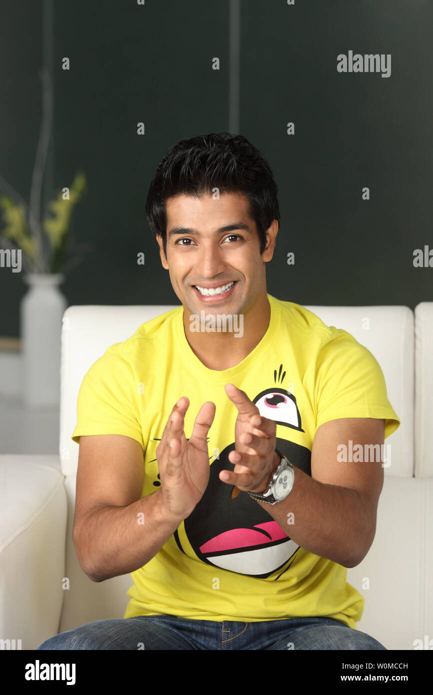 Man clapping hands Stock Photo - Alamy