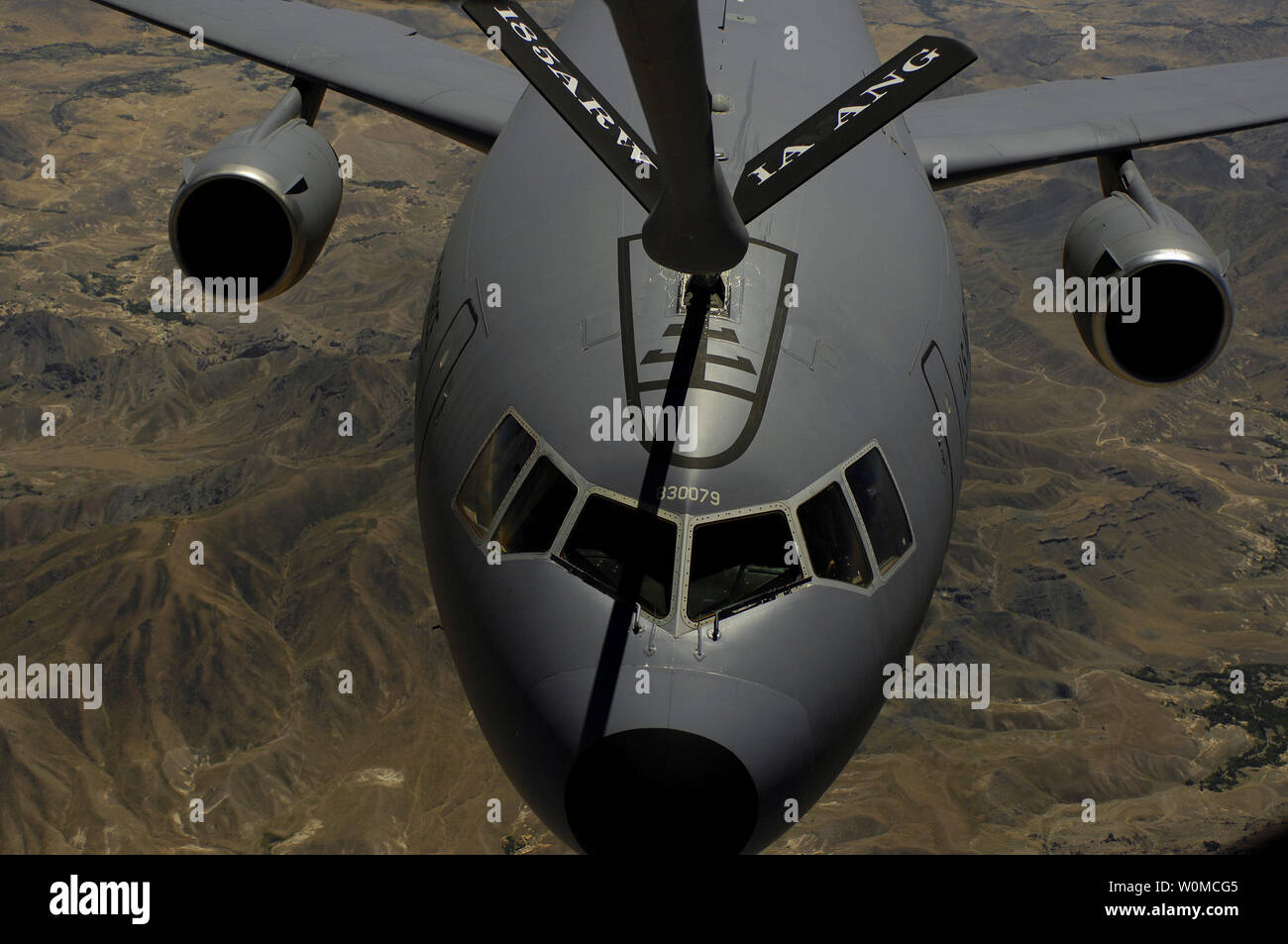 A U.S. Air Force KC-10 Extender aircraft moves into position to receive ...