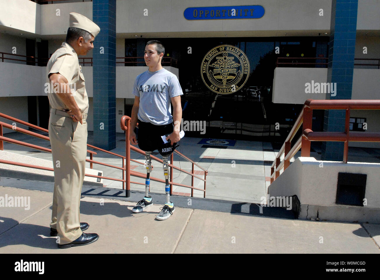 Master Chief Petty Officer of the Navy Joe R. Campa Jr. (L) speaks to U ...