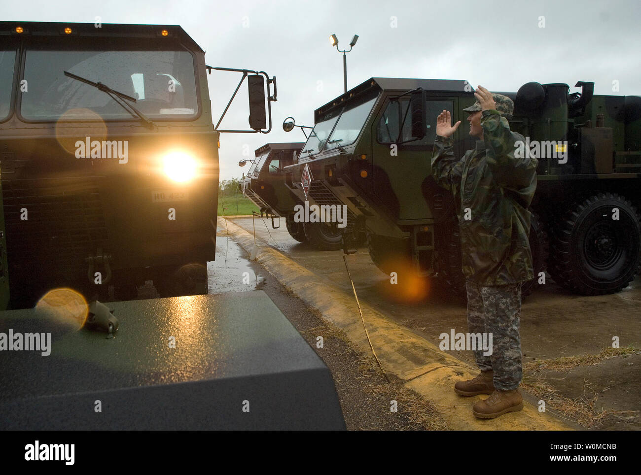 U.S. Army Sgt. 1st Class Jeff Printy directs nine light-medium tactical ...